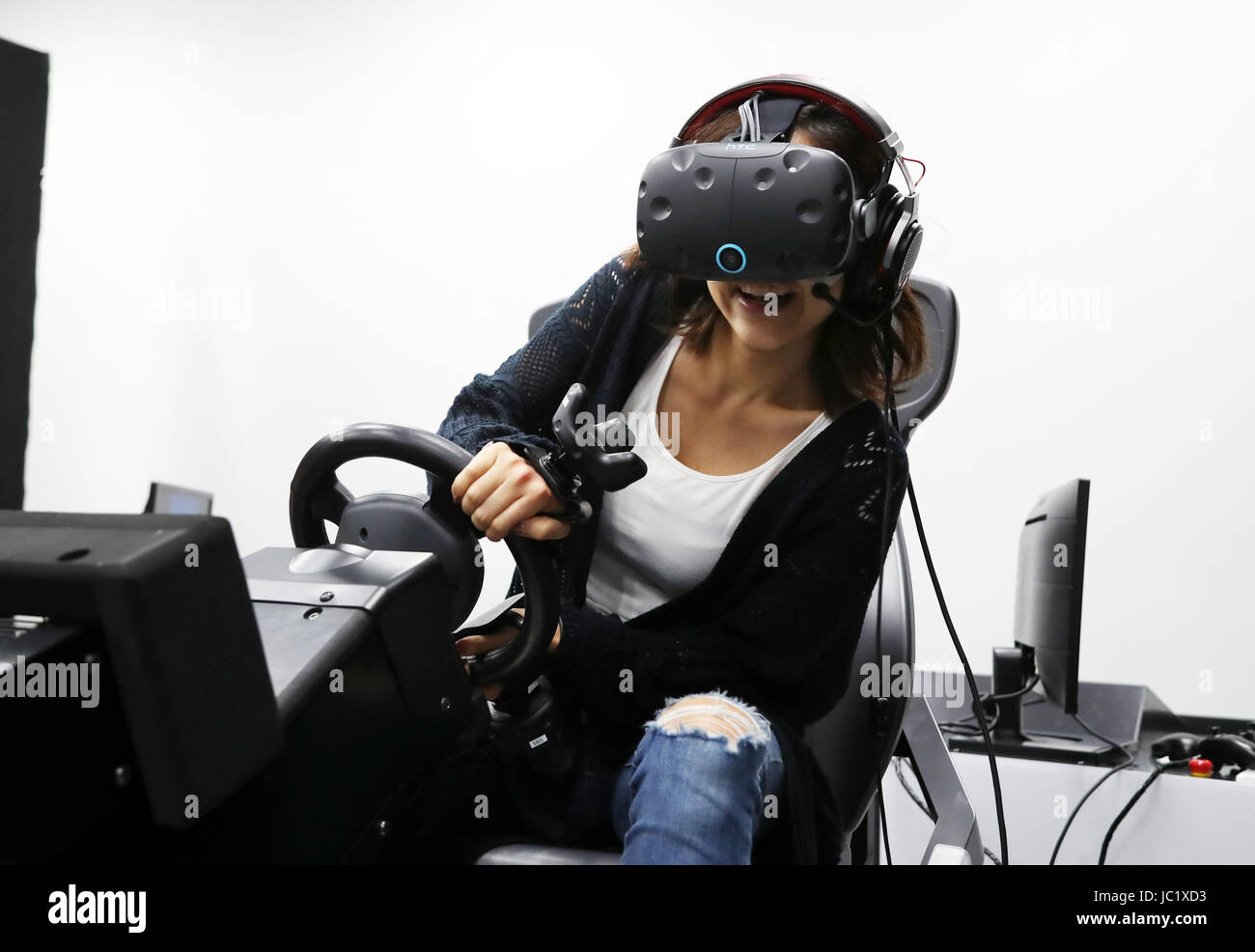June 13, 2017, Tokyo, Japan - A model demonstrates an arcade game ...