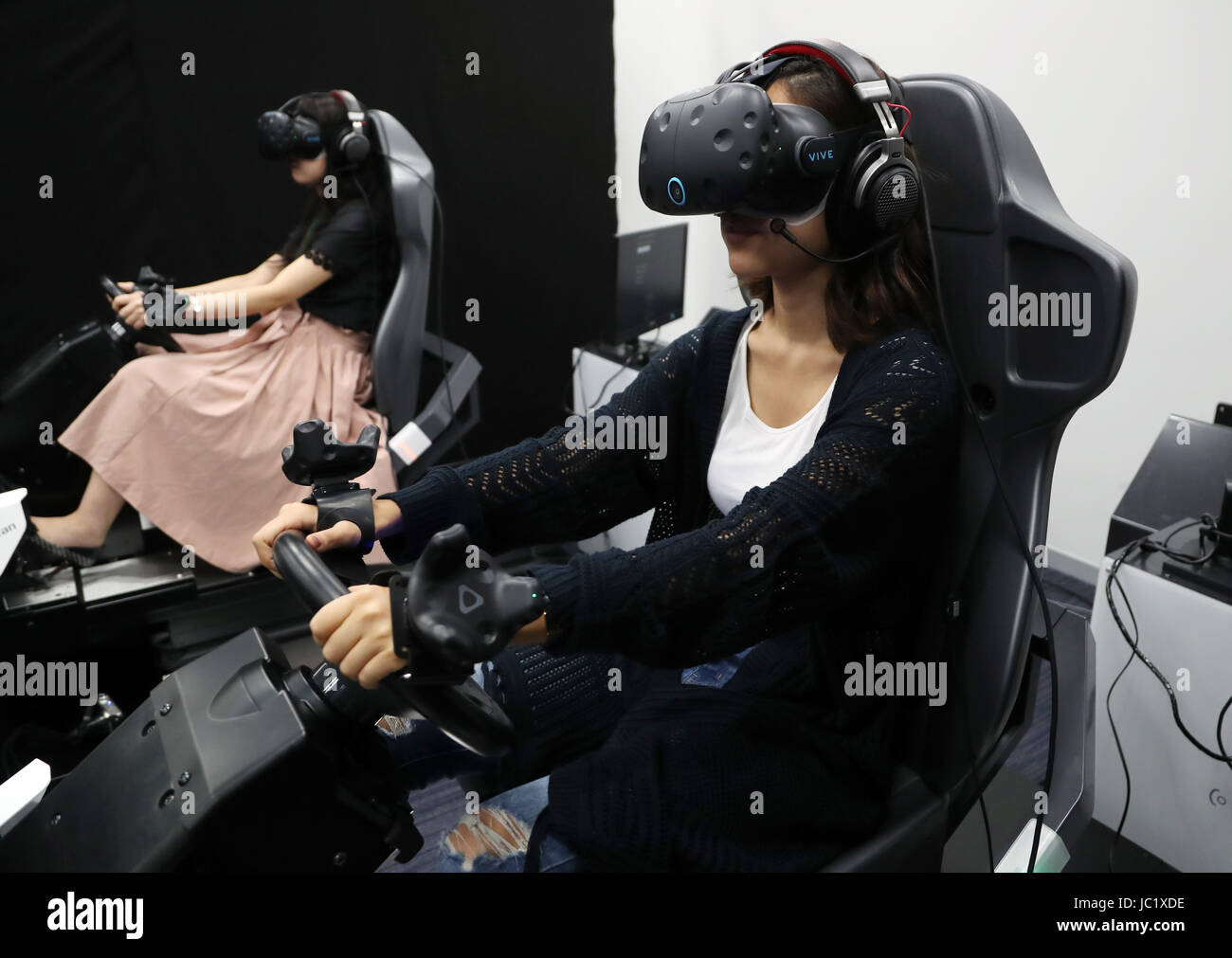 June 13, 2017, Tokyo, Japan - A model demonstrates an arcade game ...