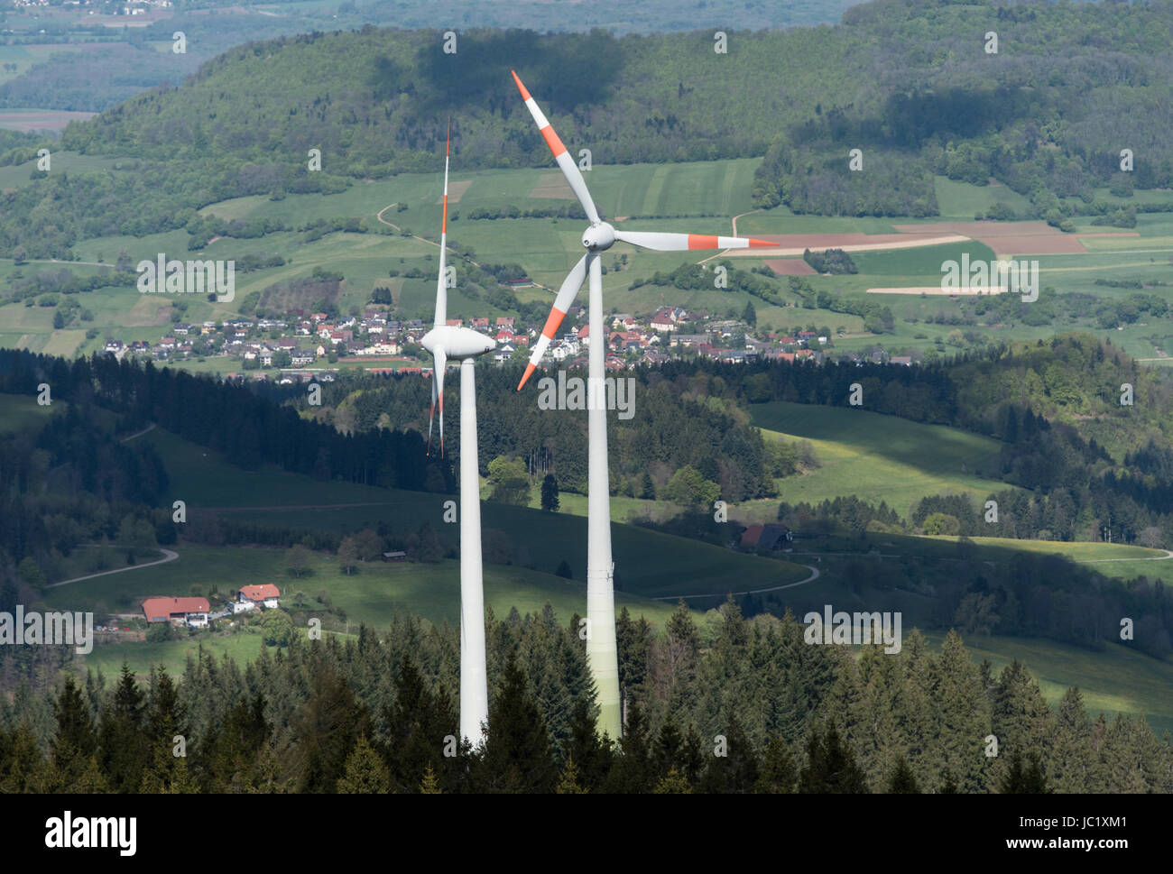Two wind wheels can be seen in the Black Forest near Horben, Germany, 2 ...