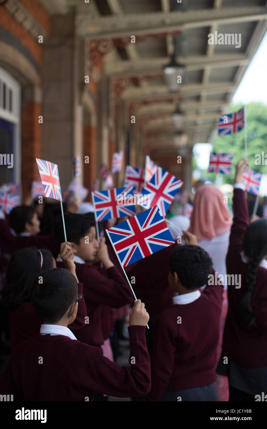 UK. 13th June, 2017. Children from the Iqra Islamic primary school wait ...