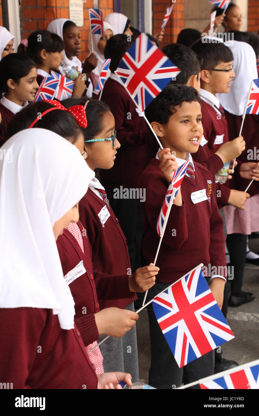 UK. 13th June, 2017. Children from the Iqra Islamic primary school wait ...