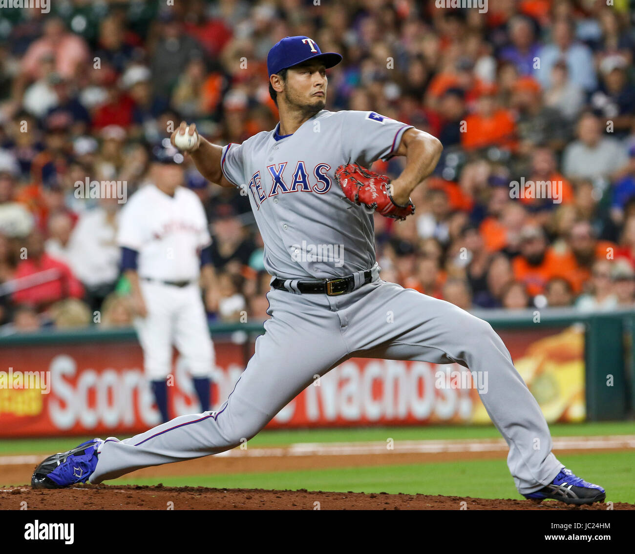 Houston, TX, USA. 12th June, 2017. Texas Rangers starting pitcher Yu ...