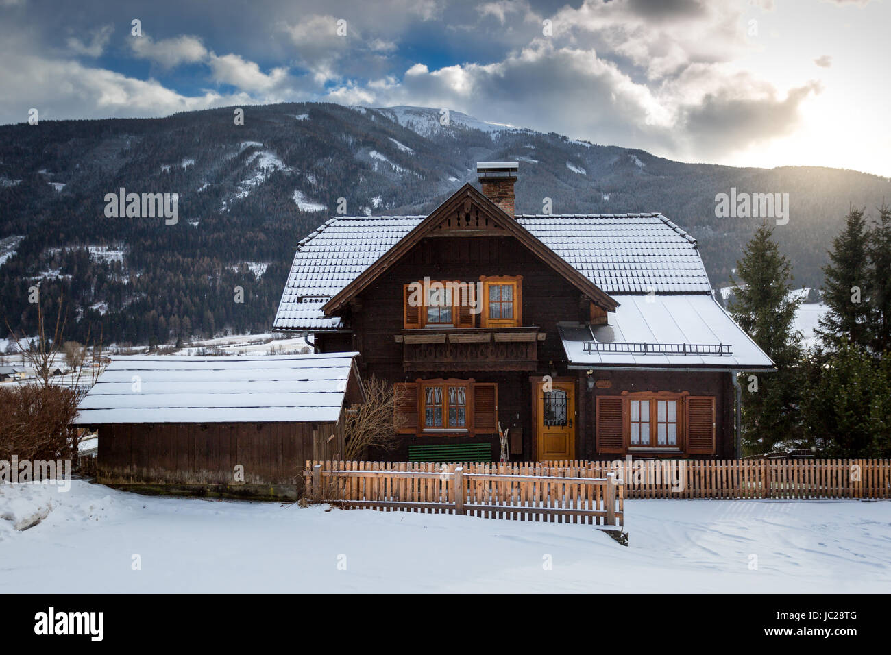 Beautiful traditional wooden house in Alps covered with snow Stock ...