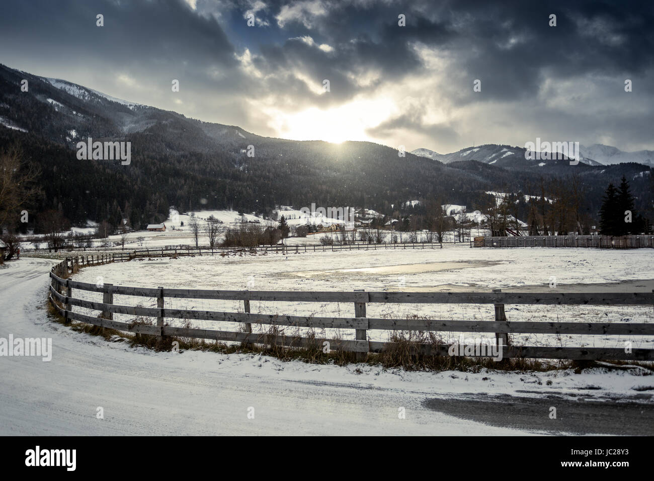 Beautiful landscape of farm with wooden fence at highland Austrian town ...