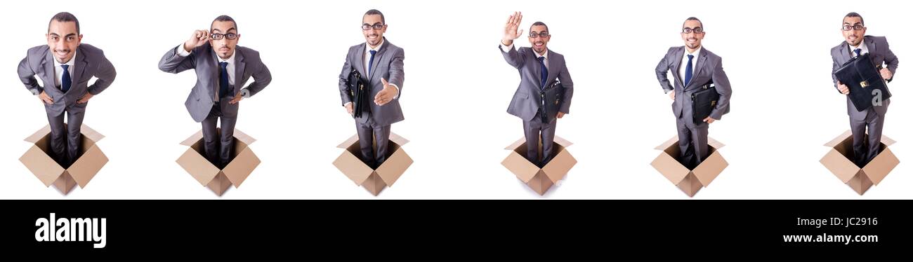 Man in thinking outside the box concept Stock Photo - Alamy