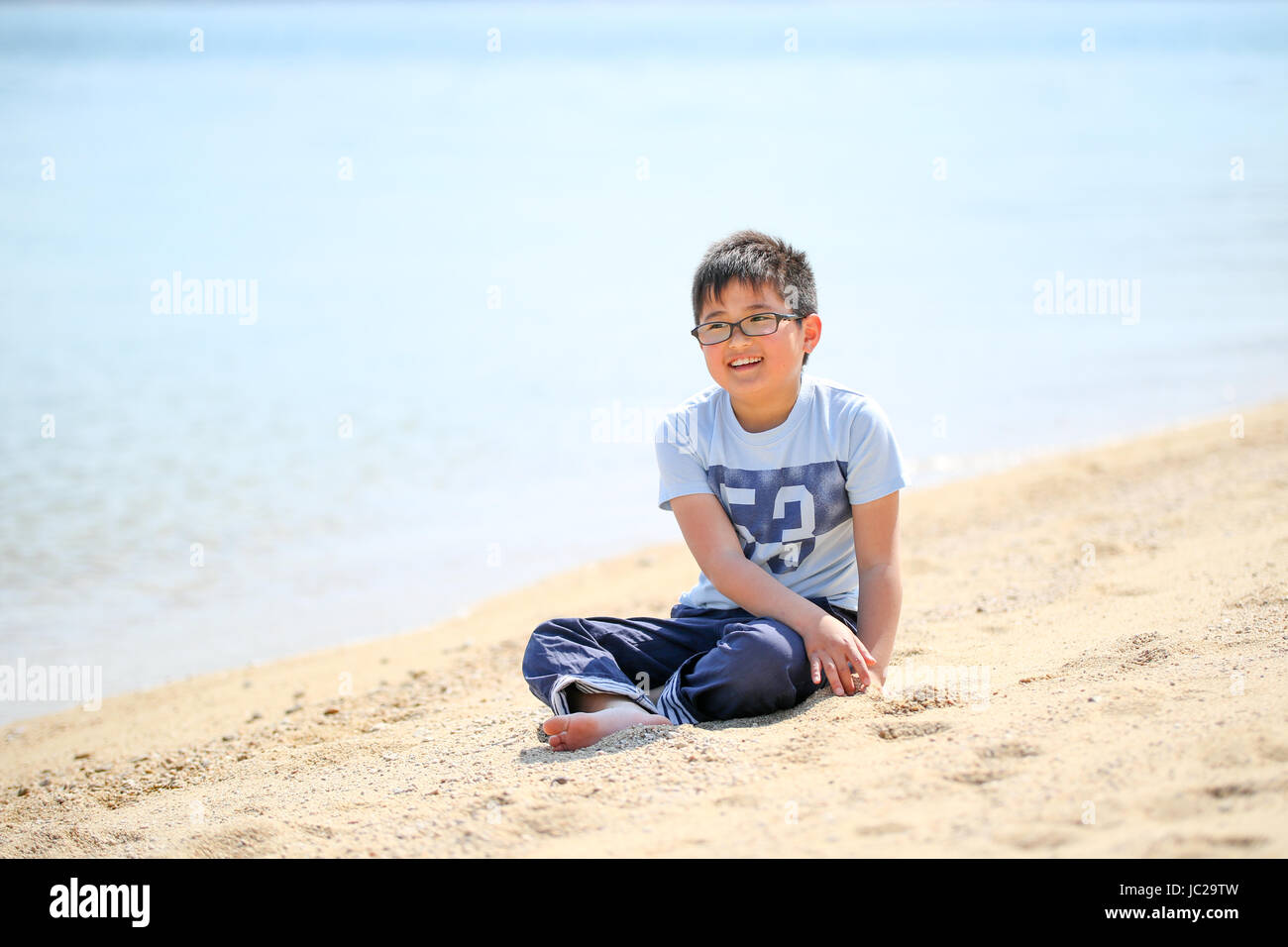 Child at Sand Beach Stock Photo - Alamy