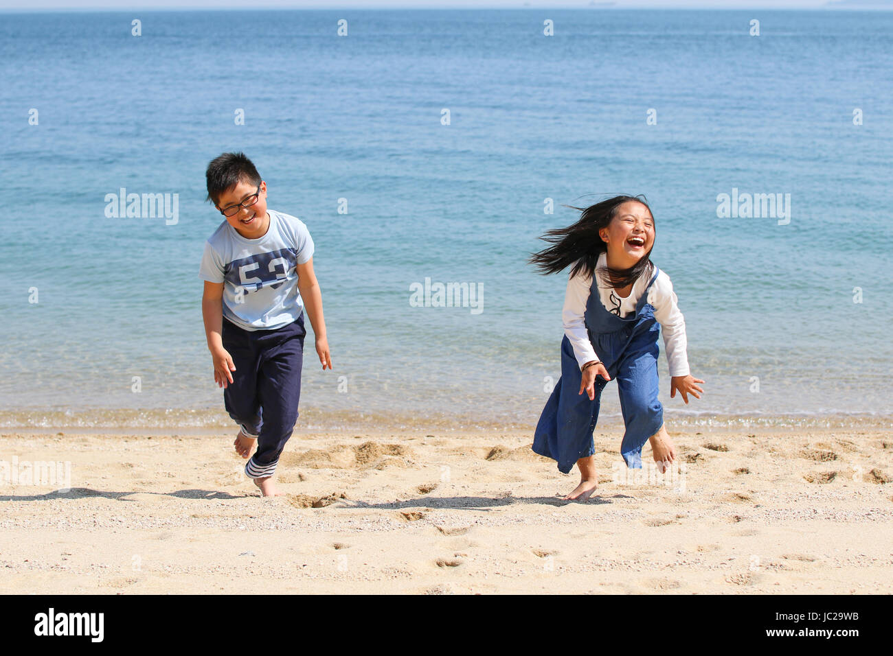 Child at Sand Beach Stock Photo - Alamy