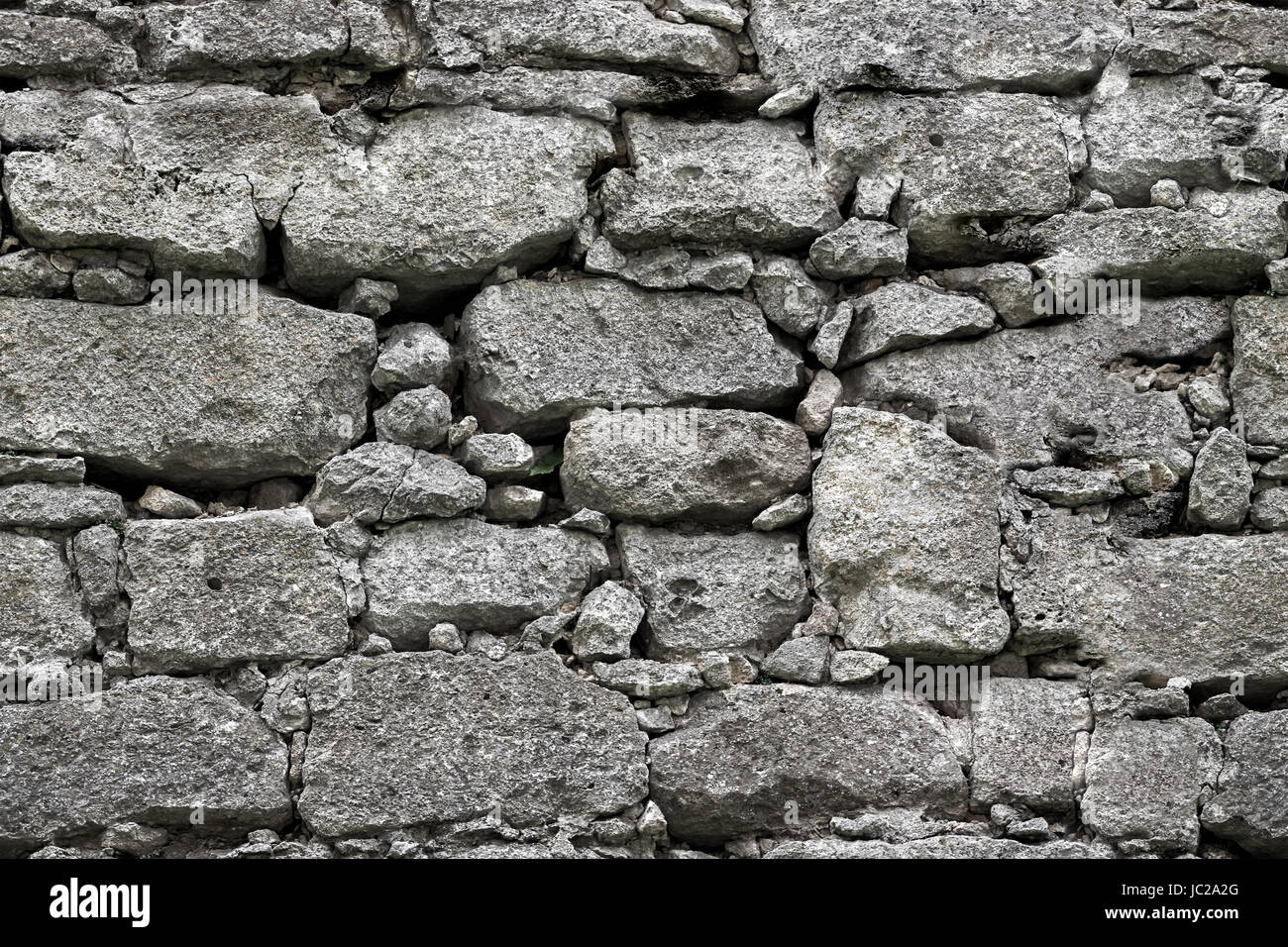 Old stone bricks wall seamless texture background Stock Photo - Alamy
