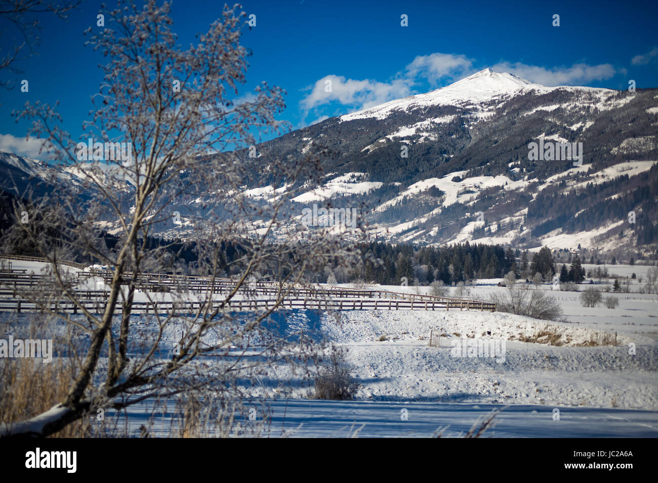 Beautiful view on valley at high Austrian mountains covered by snow ...