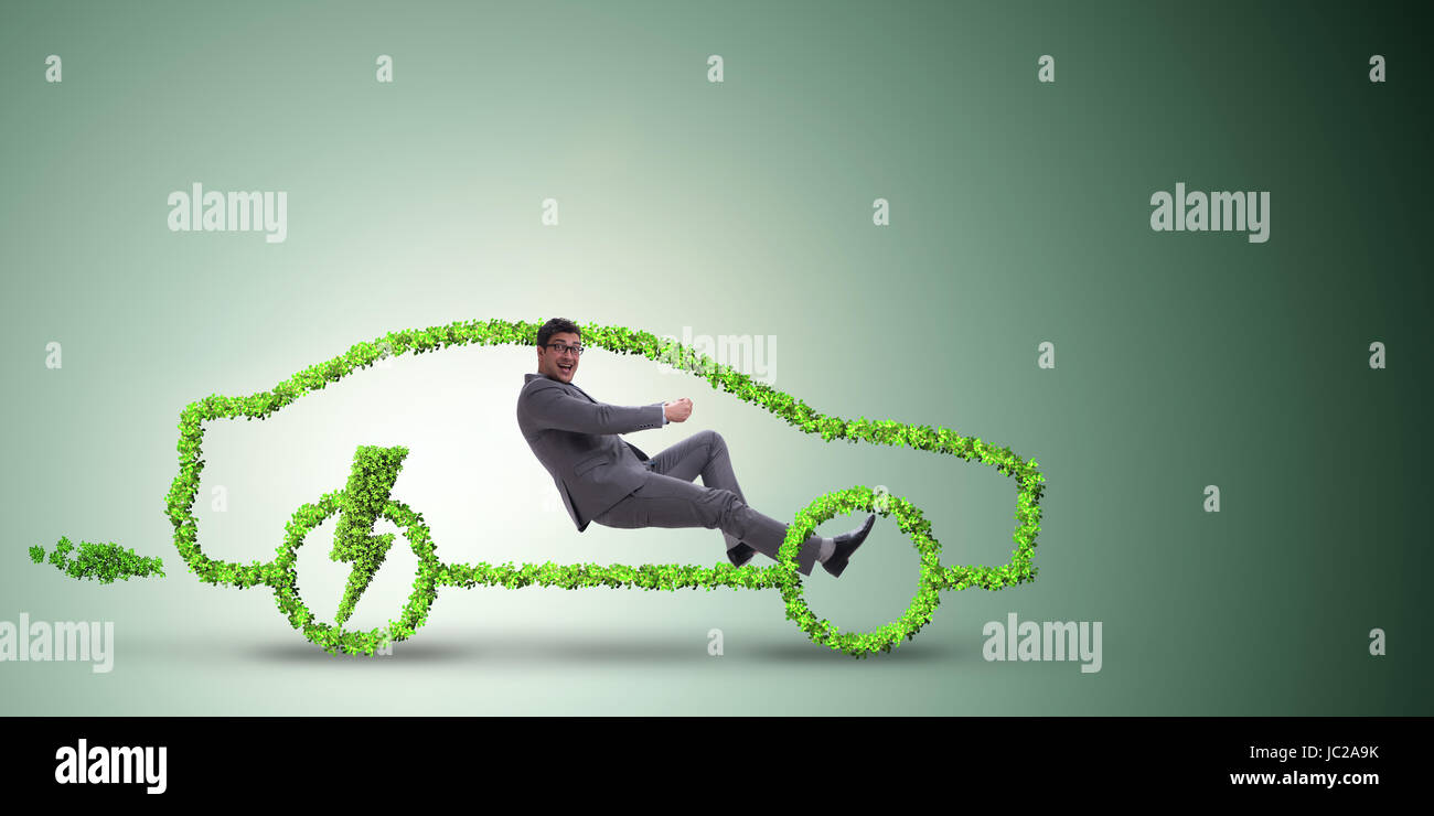 Electric car concept in green environment concept Stock Photo - Alamy