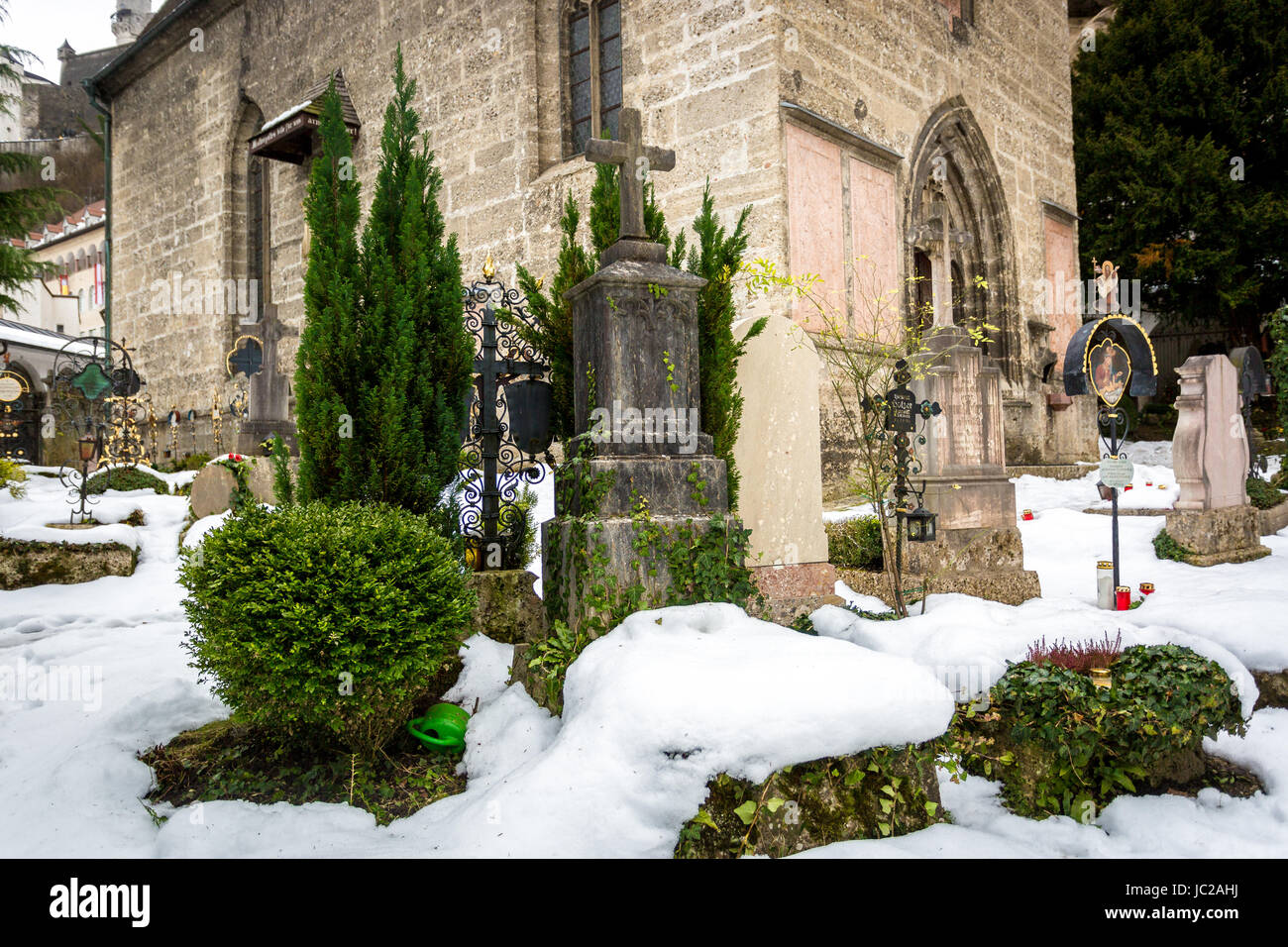Big cemetery covered by snow at old churchyard Stock Photo - Alamy