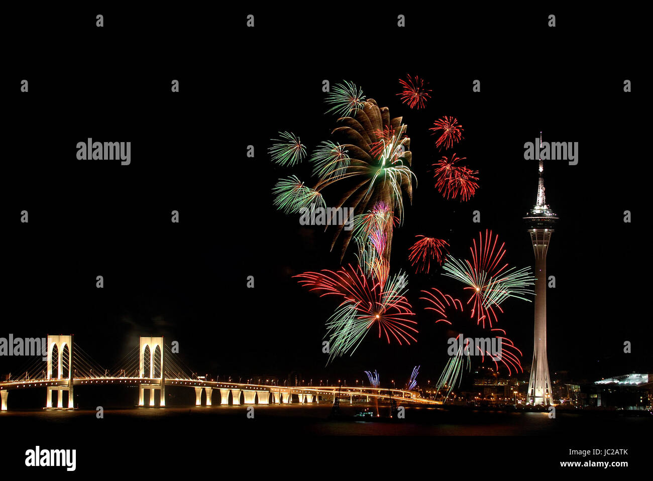 Celebration of New Year in Macau with fireworks beside the Tower ...