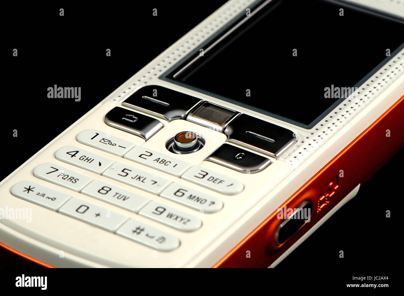 Close up of modern mobile phone over black Stock Photo - Alamy