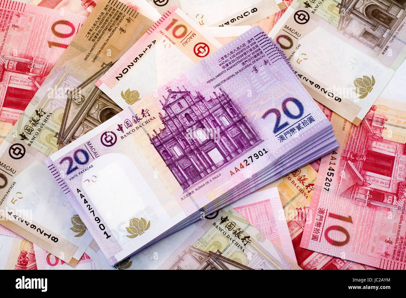 The stack of Macau Patacas (notes) and background Stock Photo - Alamy