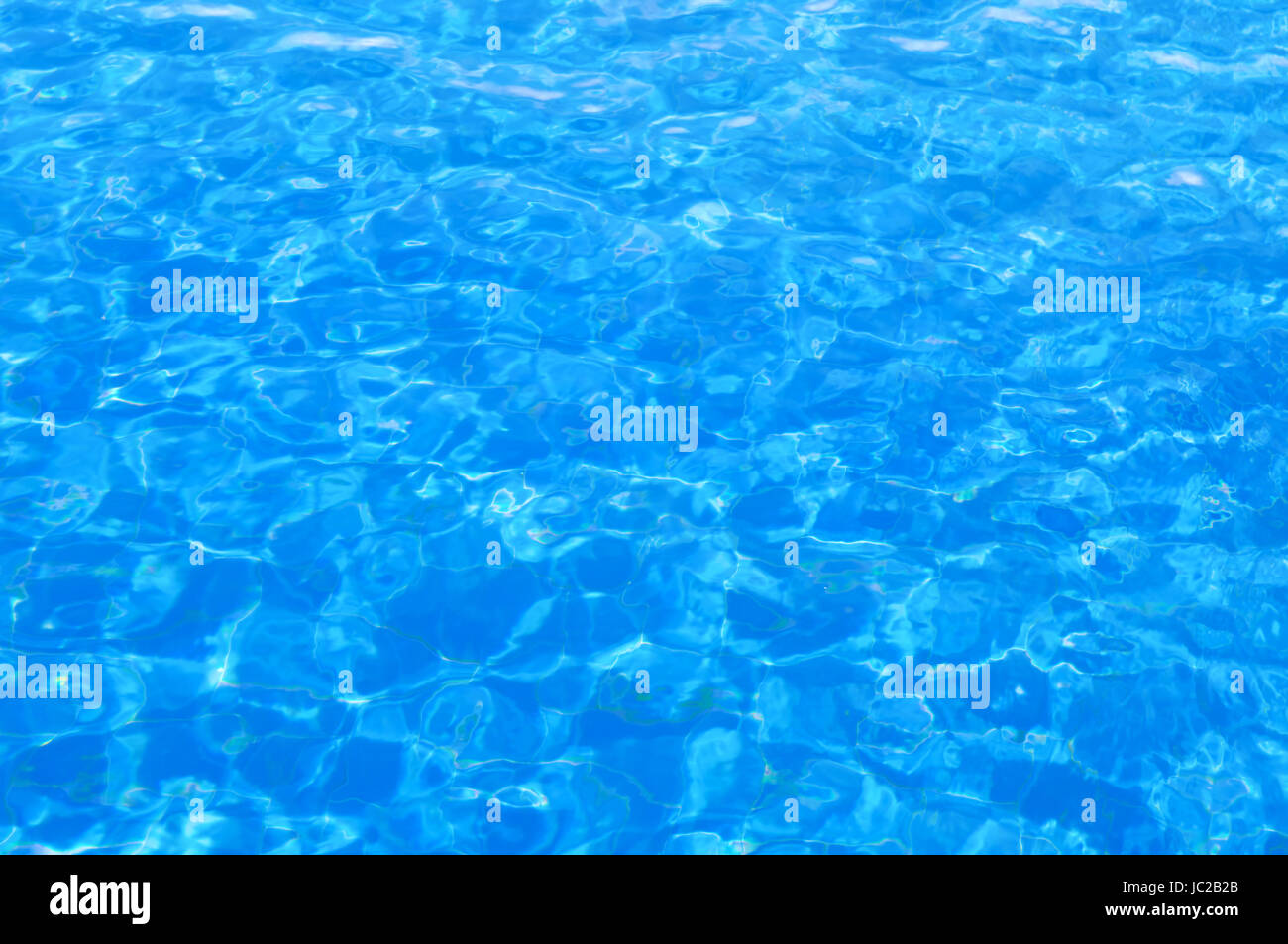 Waves on a surface of water in pool Stock Photo - Alamy