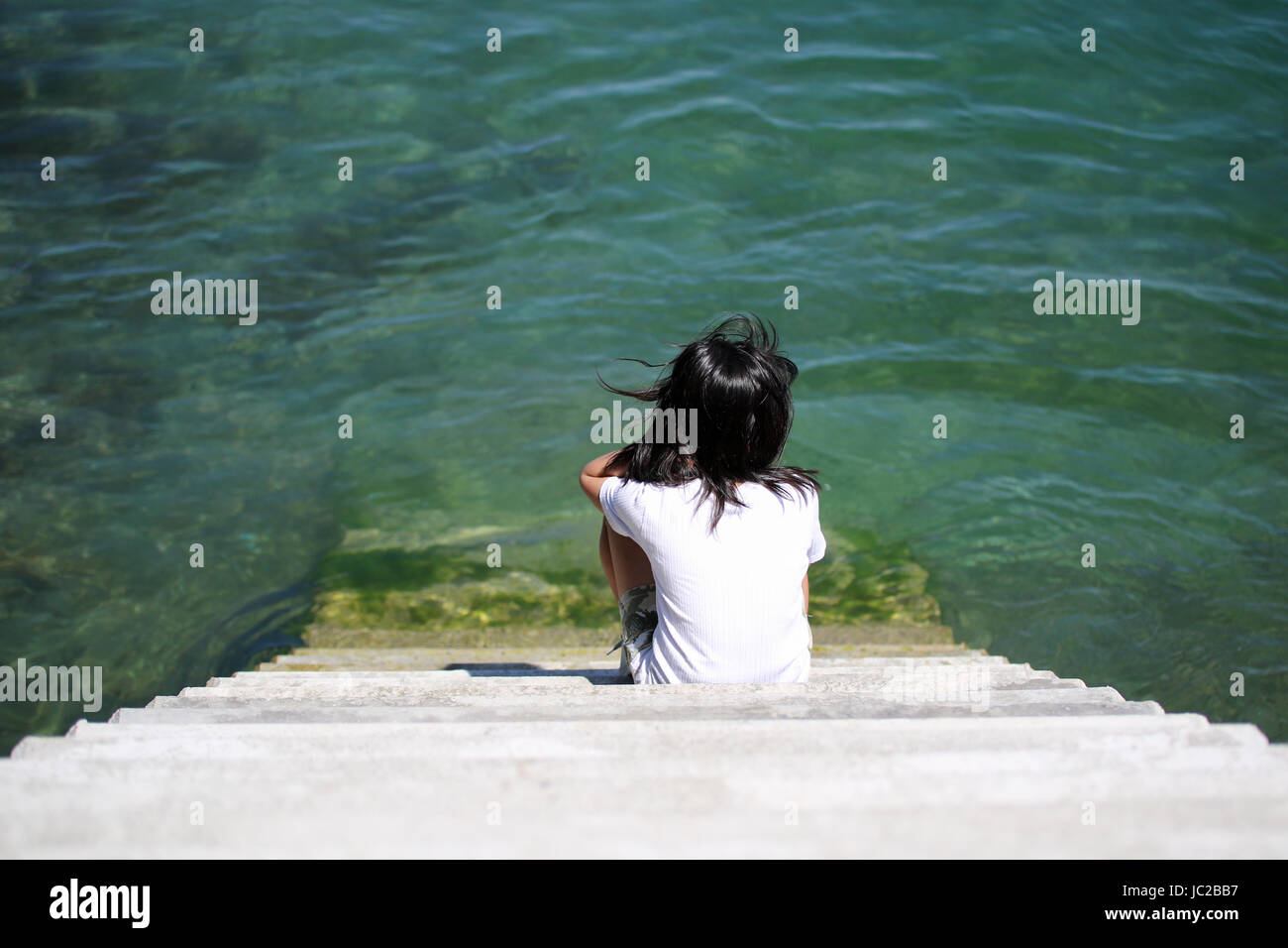 Sea and Girl Stock Photo - Alamy