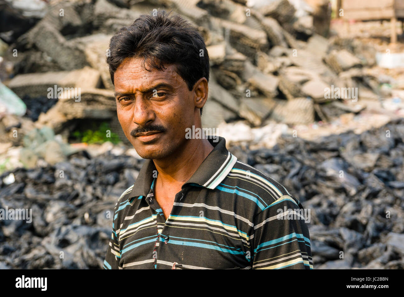 A man dumping a garbage bag hi-res stock photography and images - Alamy