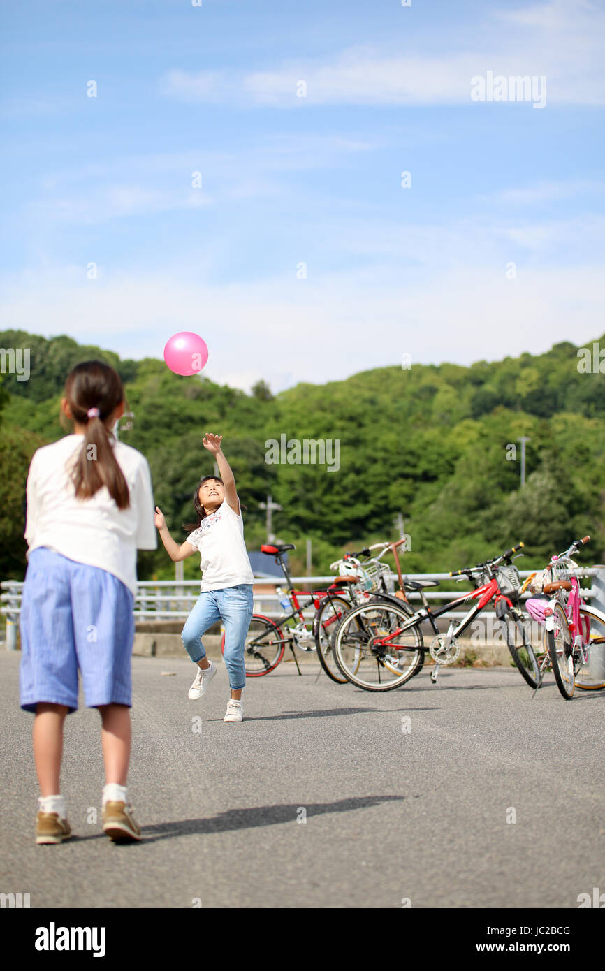 Children Playing with Ball Stock Photo - Alamy