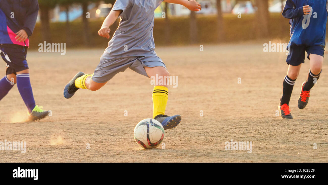 Practicing Soccer after School Stock Photo - Alamy