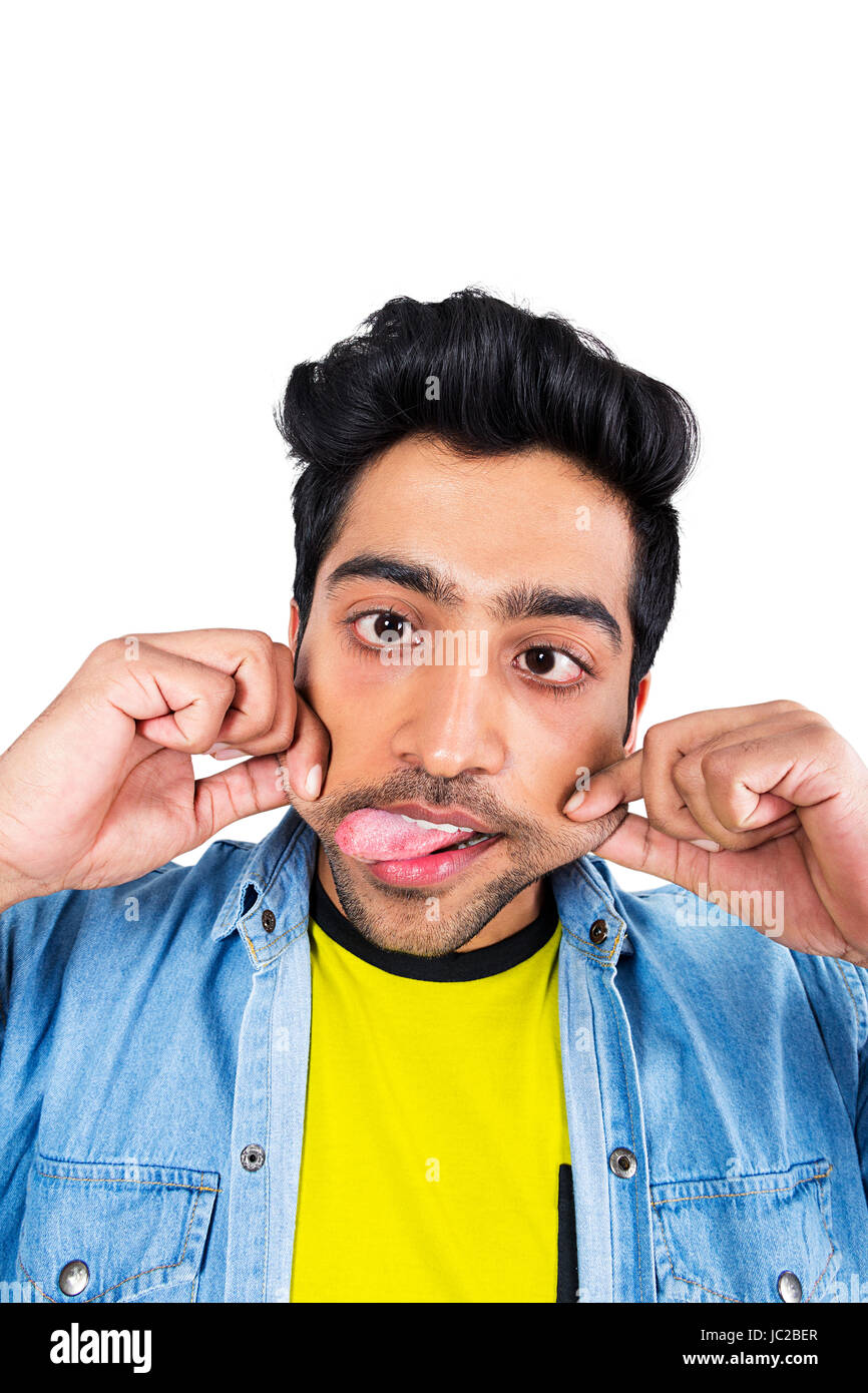 Man Mocking Teasing Showing Grimacing Tongue Face Stock Photo - Alamy