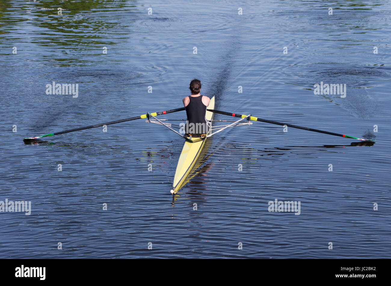 young lady rowing in a canoe Stock Photo - Alamy