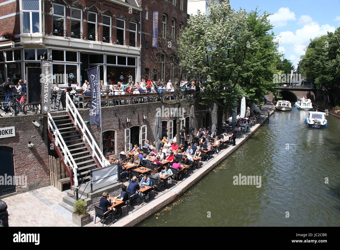 Very crowded terrace along Oudegracht canal in the old inner city of ...
