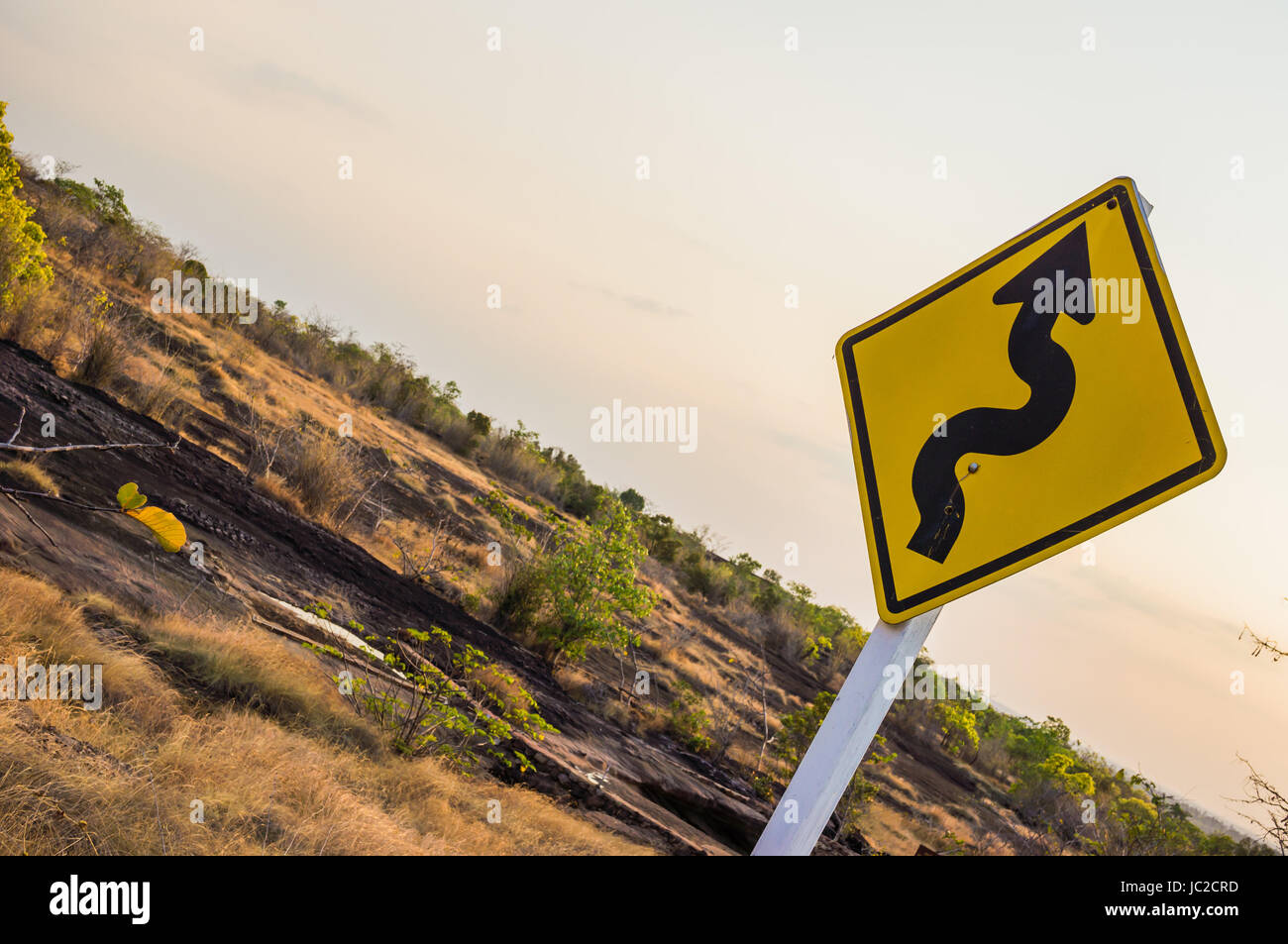 A Twist Sign Post Beside the Road, Among Nature Stock Photo - Alamy