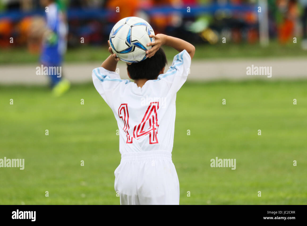 Soccer throw in hi-res stock photography and images - Alamy