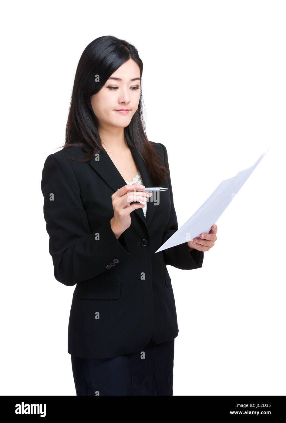 Asian business woman look at information on paper Stock Photo - Alamy