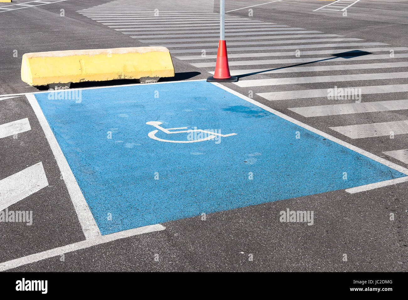Disabled sign - road paint marking on asphalt Stock Photo - Alamy