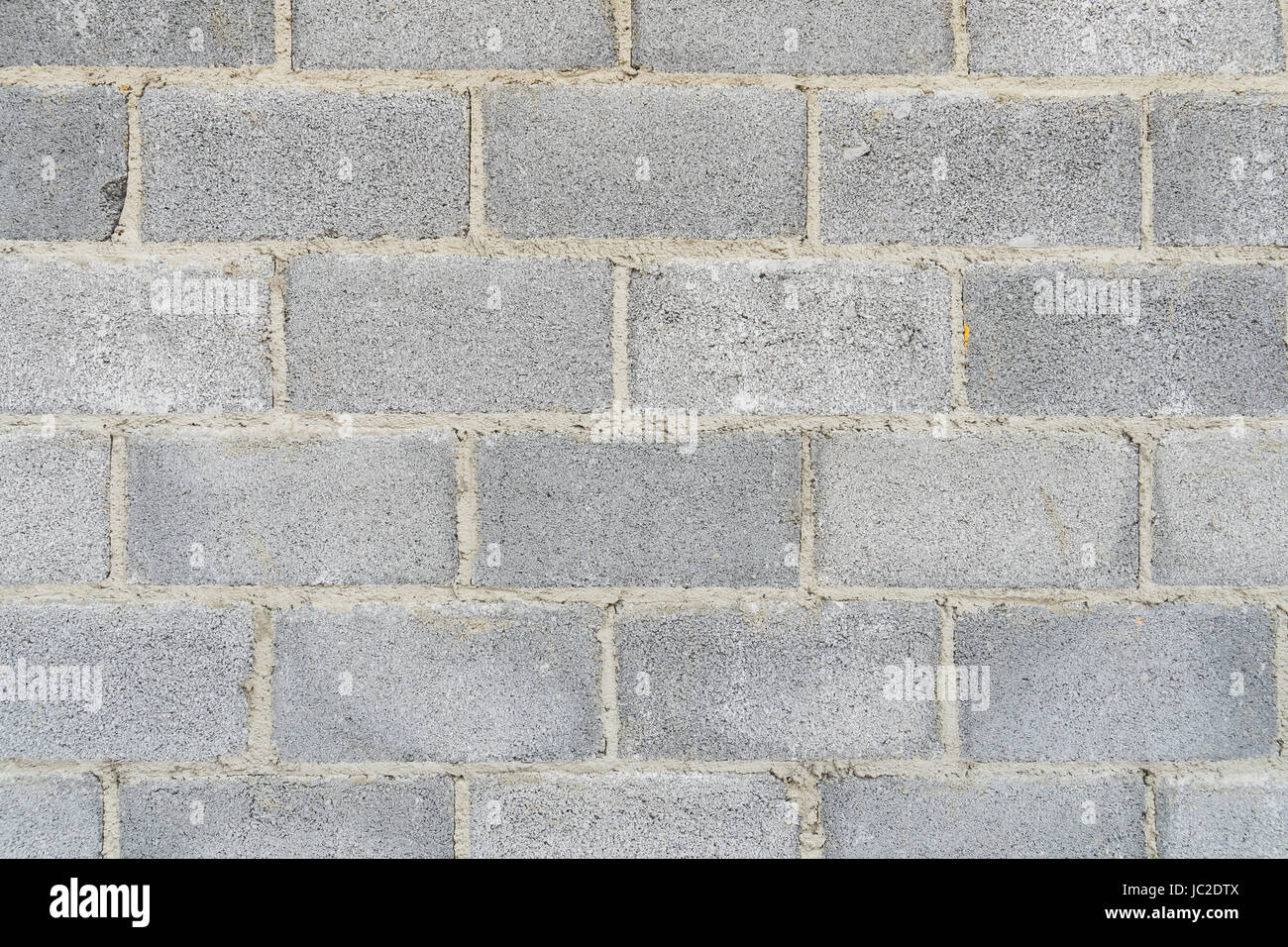 Grey stone bricks wall texture or background Stock Photo - Alamy