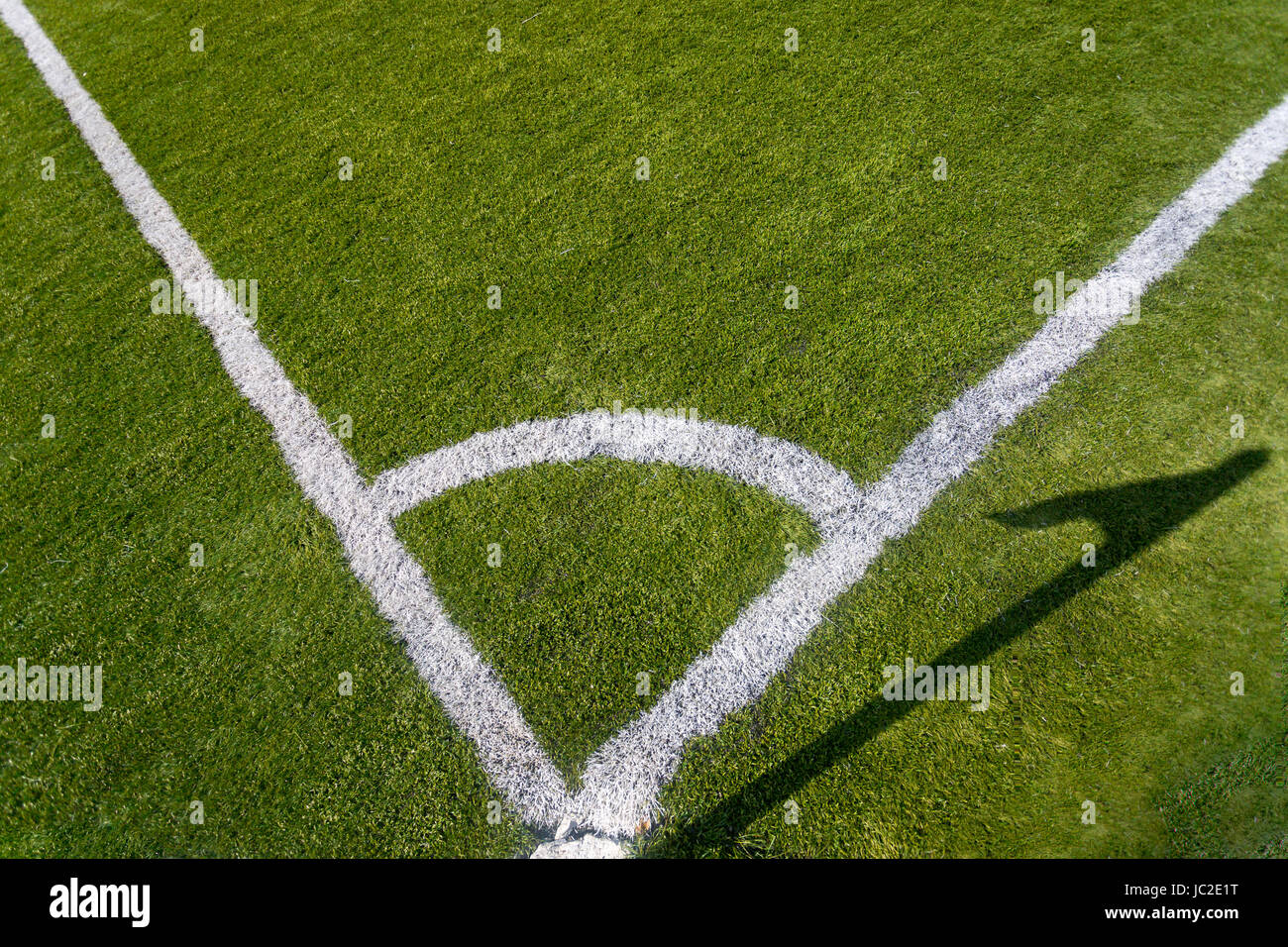 Closeup shot of corner marking on grass soccer field Stock Photo - Alamy