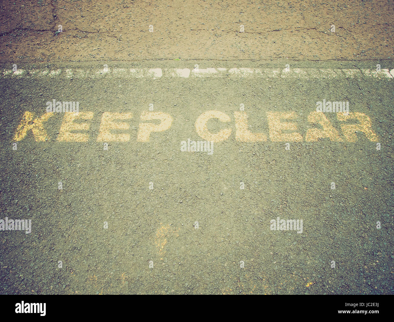 Vintage retro looking A traffic sign on asphalt street - Keep clear ...