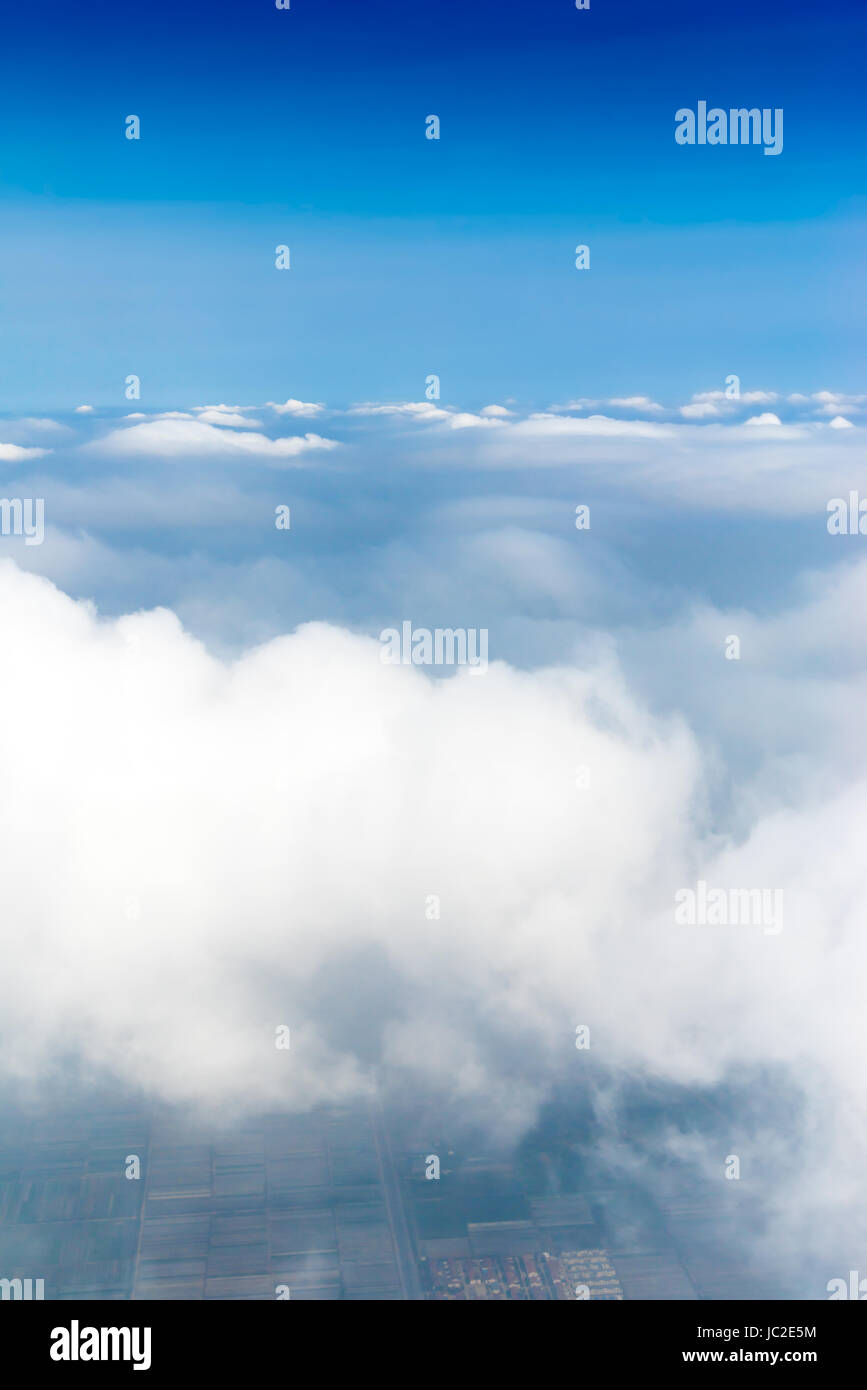 Above the sky, view from airplane, Vertical Shot Stock Photo - Alamy