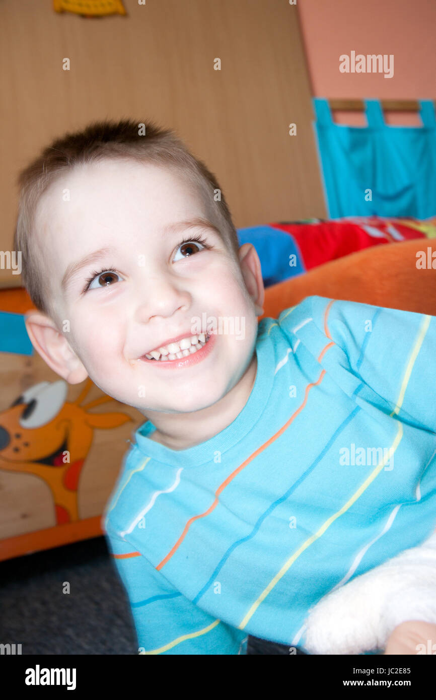 detail of happy face boy at home Stock Photo - Alamy