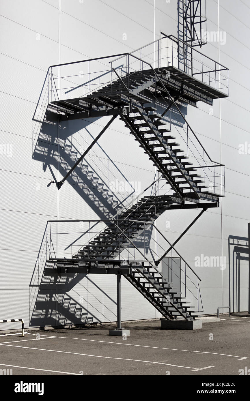 Metal staircase on fire exit at big factory Stock Photo - Alamy