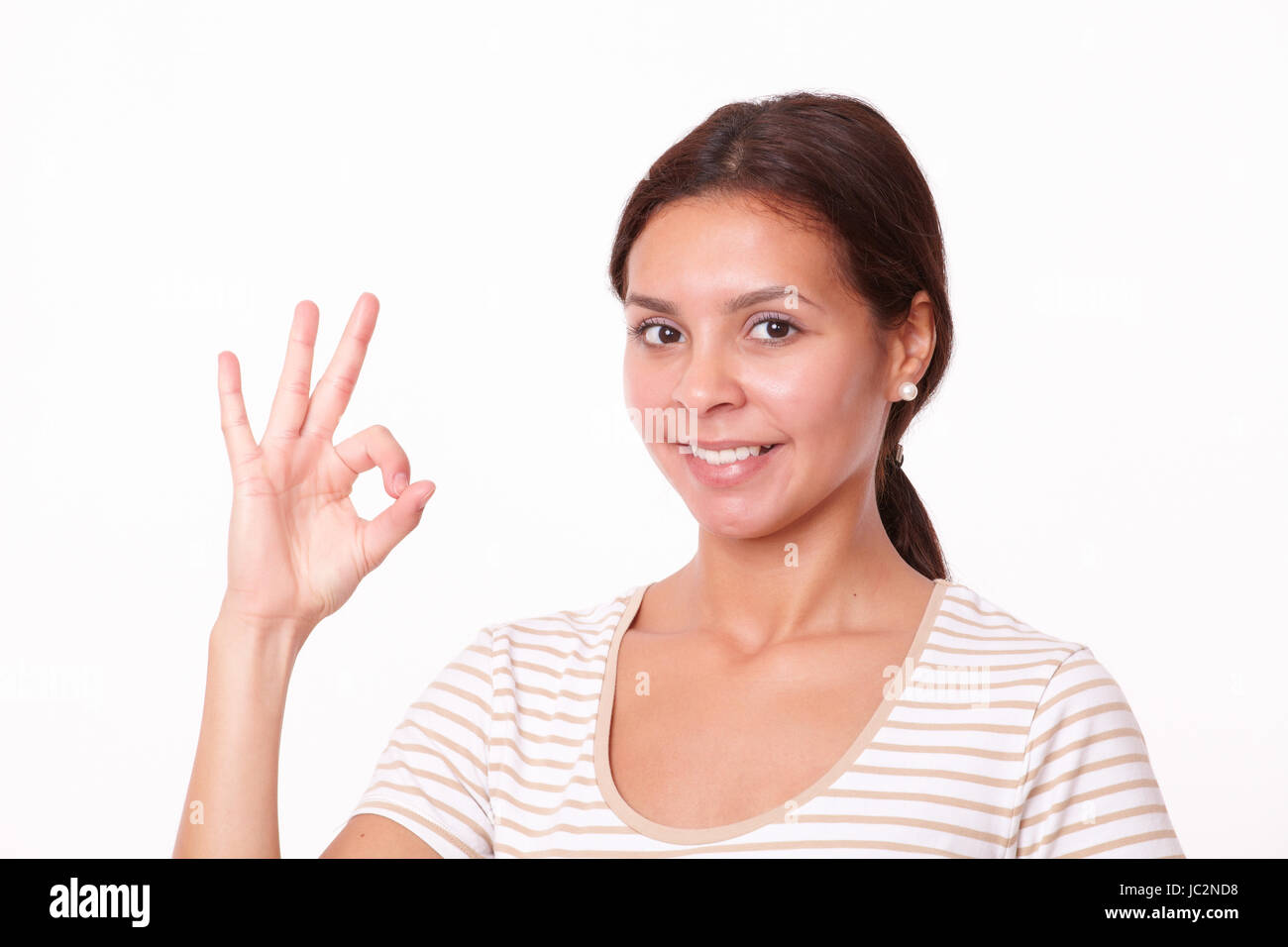 Portrait of pretty charming woman with ok sign smiling at you on ...