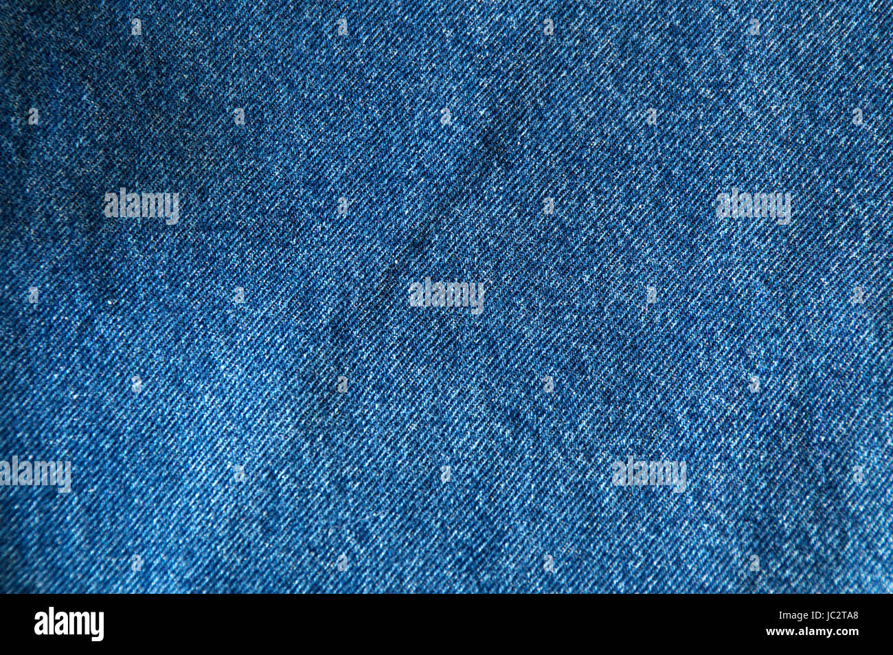 Close up of blue denim filling image Stock Photo - Alamy