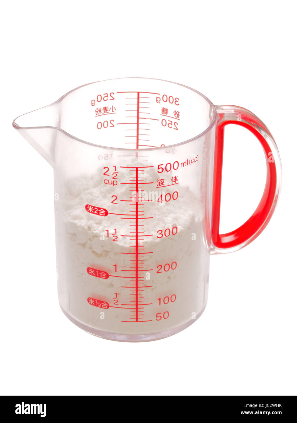 close up of a cooking measuring cup isolated Stock Photo - Alamy