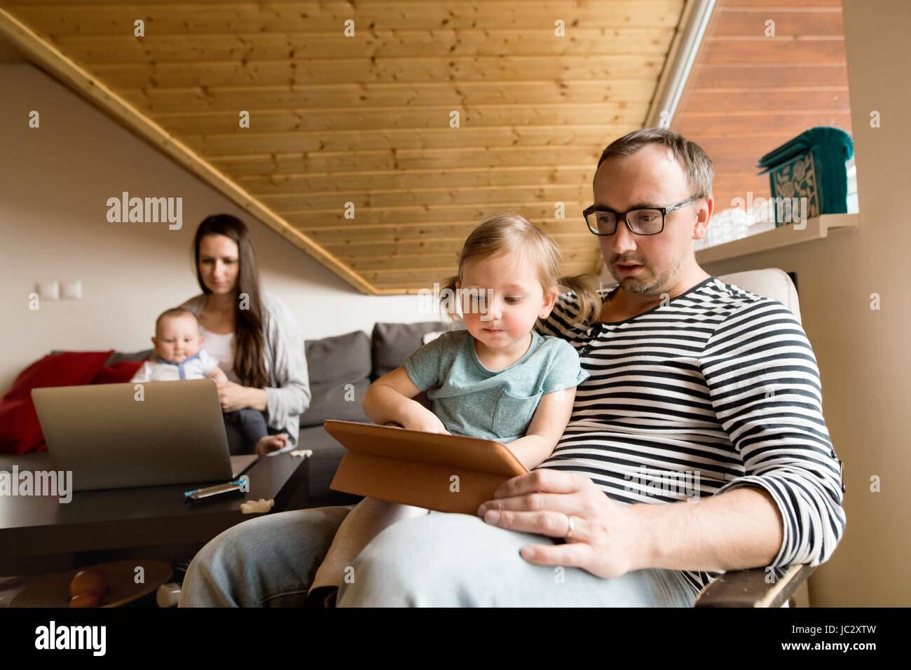 Family gadgets hi-res stock photography and images - Alamy