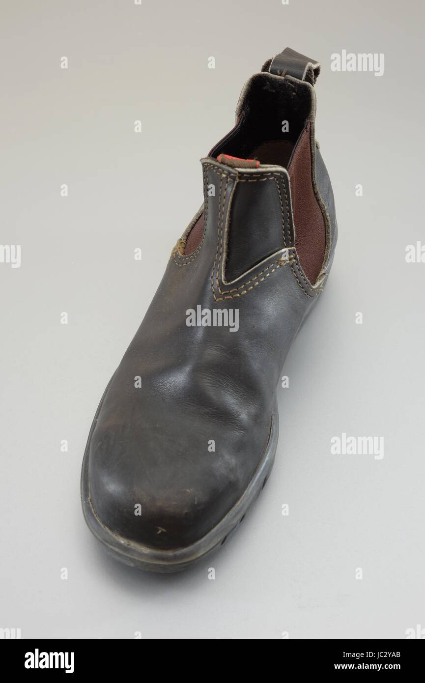 A close up shot of work boots Stock Photo - Alamy