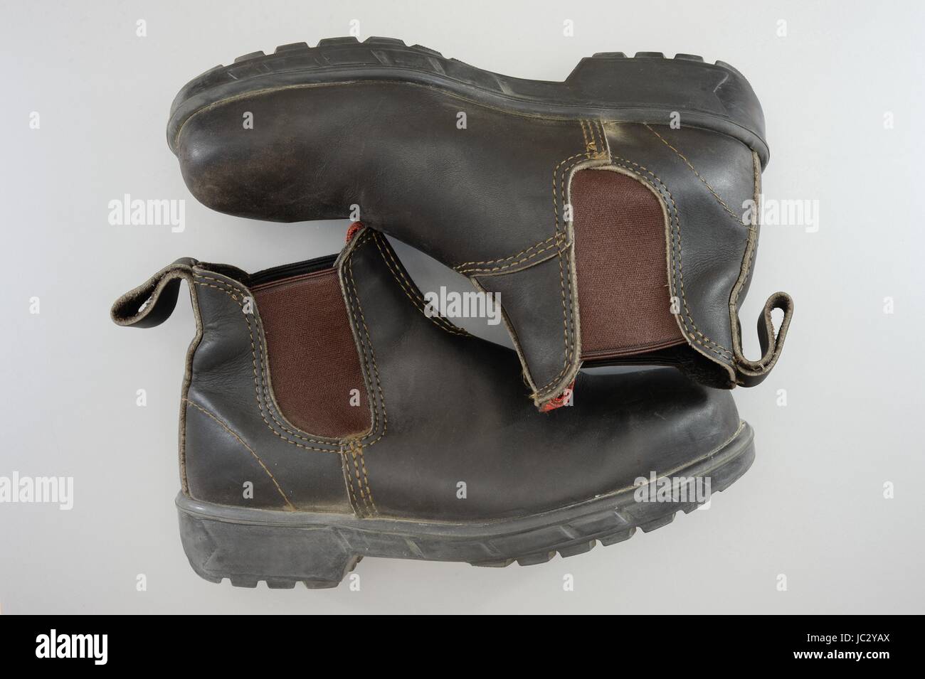 A close up shot of work boots Stock Photo - Alamy