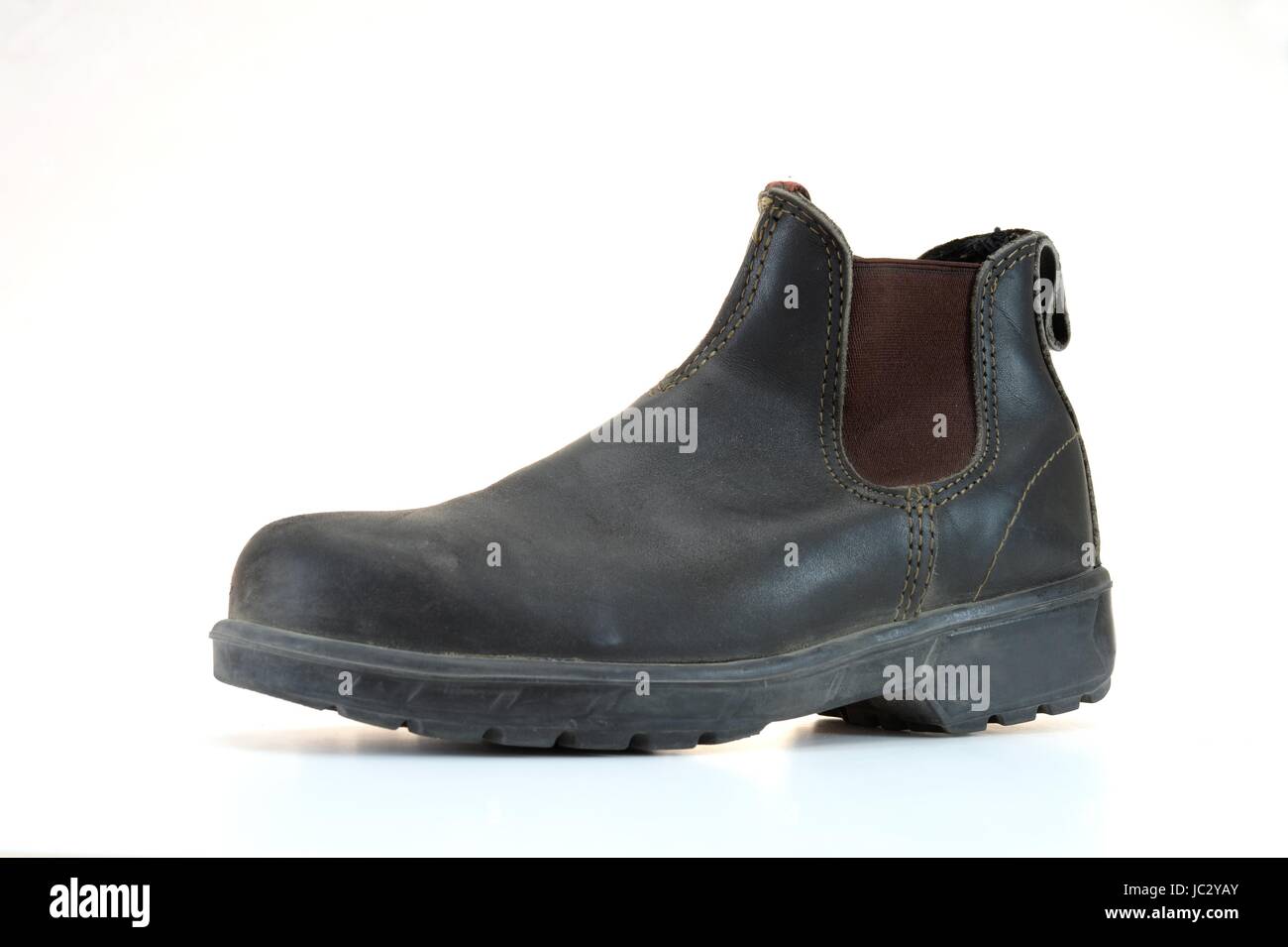A close up shot of work boots Stock Photo - Alamy