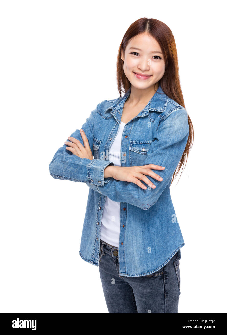 Young woman with cross arm Stock Photo - Alamy