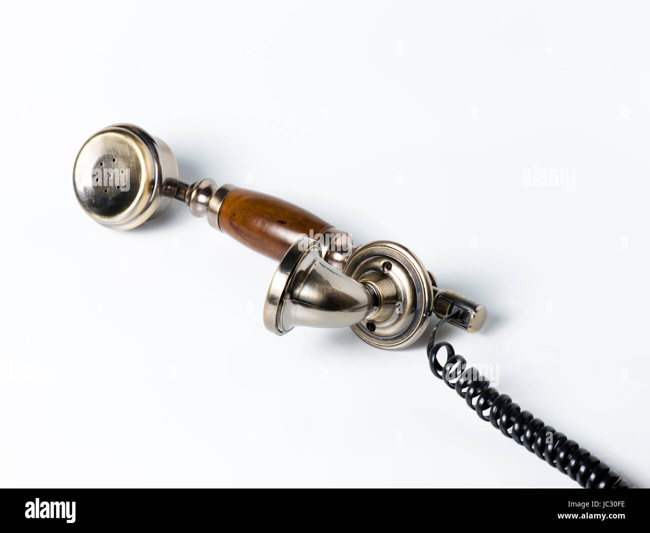 Old wooden phone receiver on white background Stock Photo - Alamy