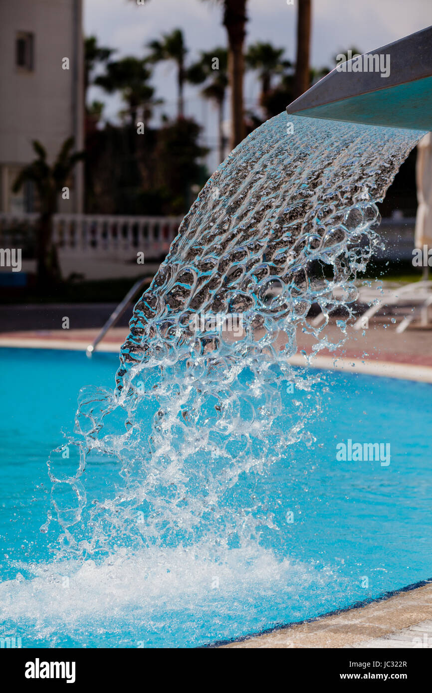 Waterfall jet and texture of falling water at the background of ...