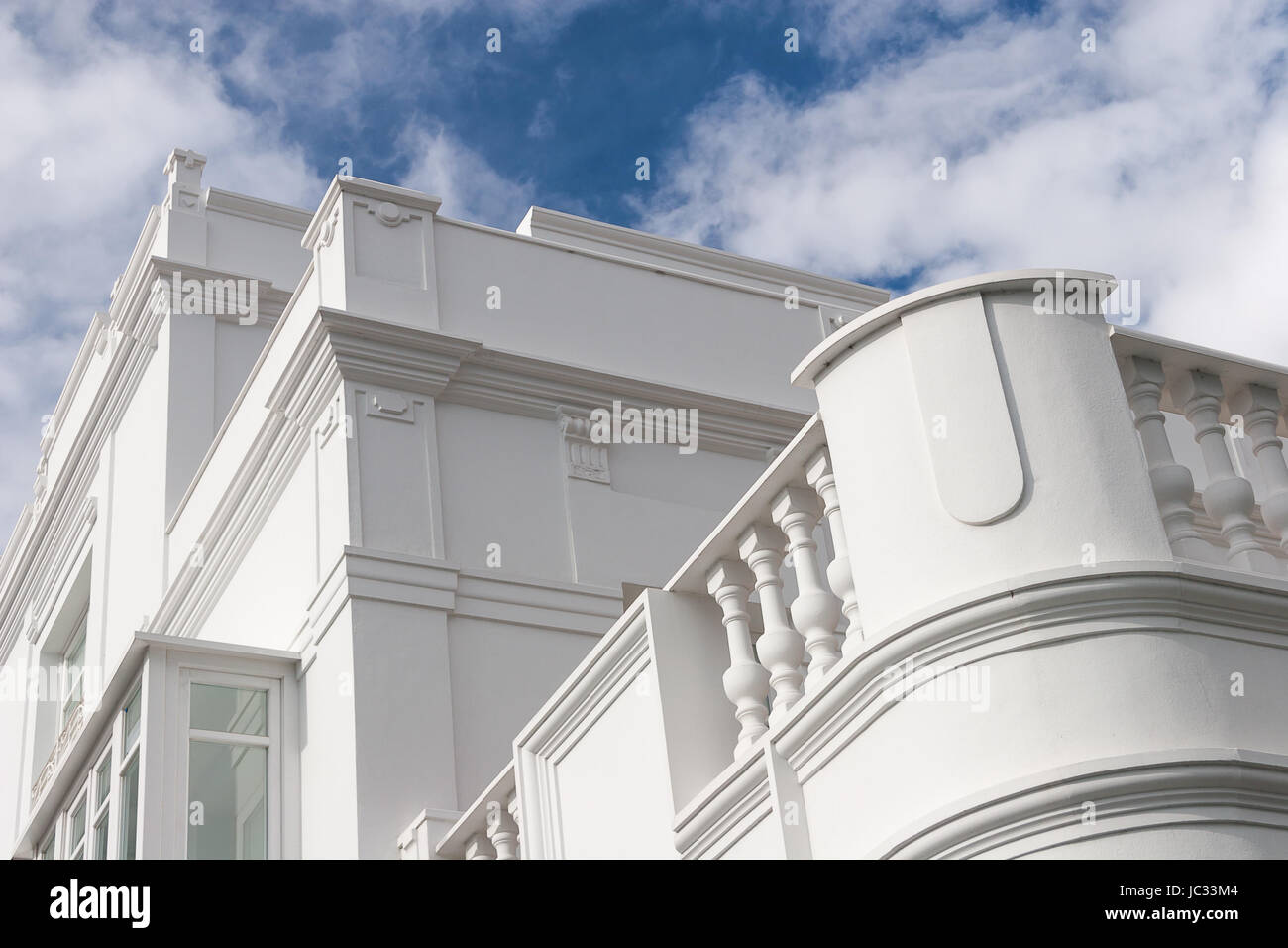 Bright White building facade at sunny day Stock Photo - Alamy