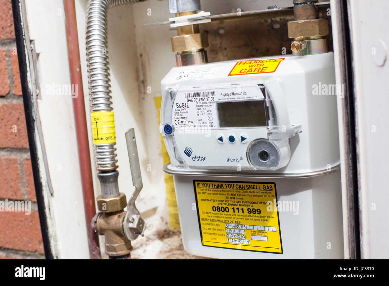 An external gas meter with a smart meter attached Stock Photo - Alamy