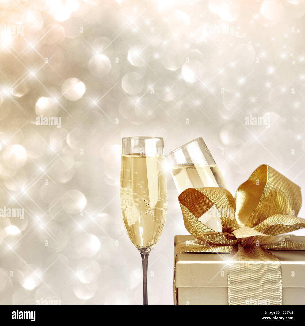 Toasting with champagne glasses very festive background with christmas ...