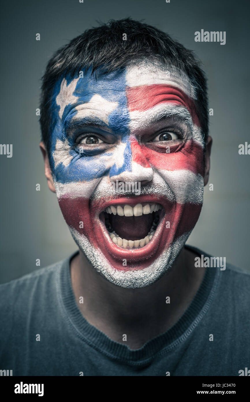 Portrait of exited man with US flag painted on face Stock Photo - Alamy